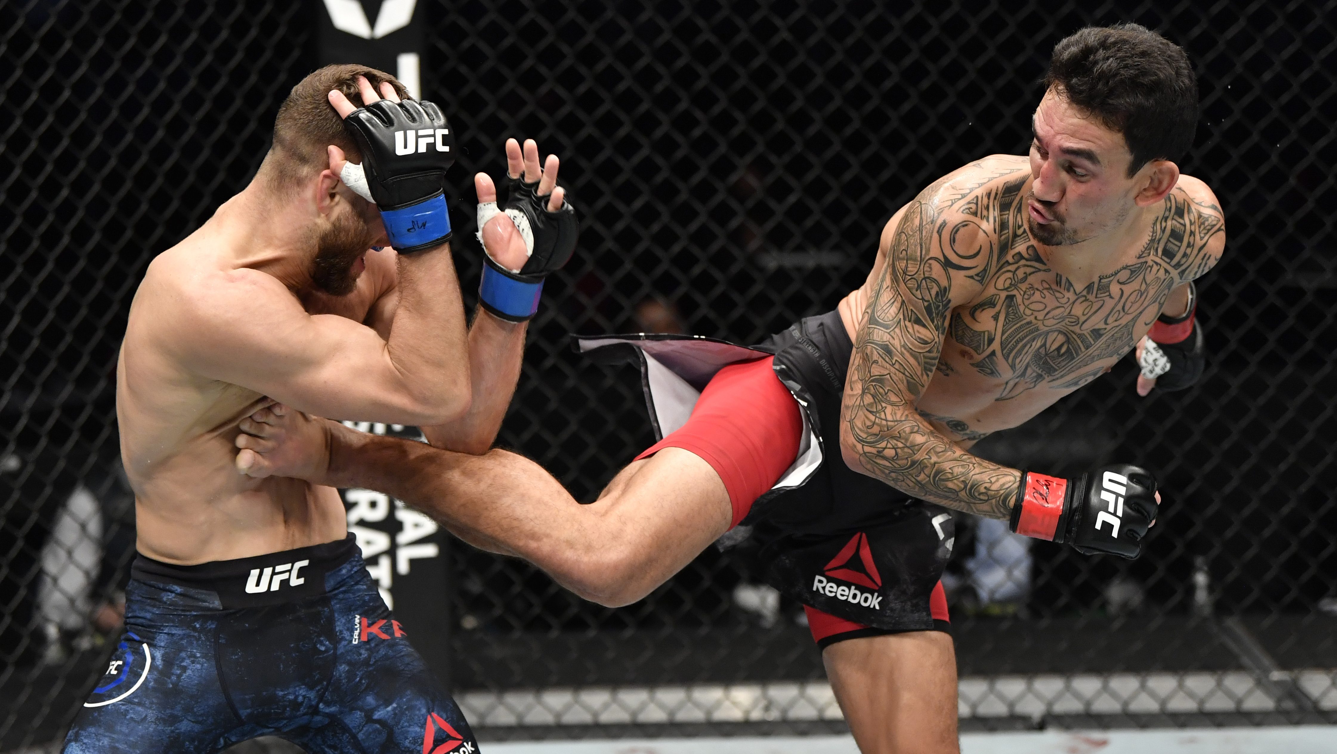 UFC’s Max Holloway Earns Viral Moment & Epic Interview [WATCH] | Heavy.com
