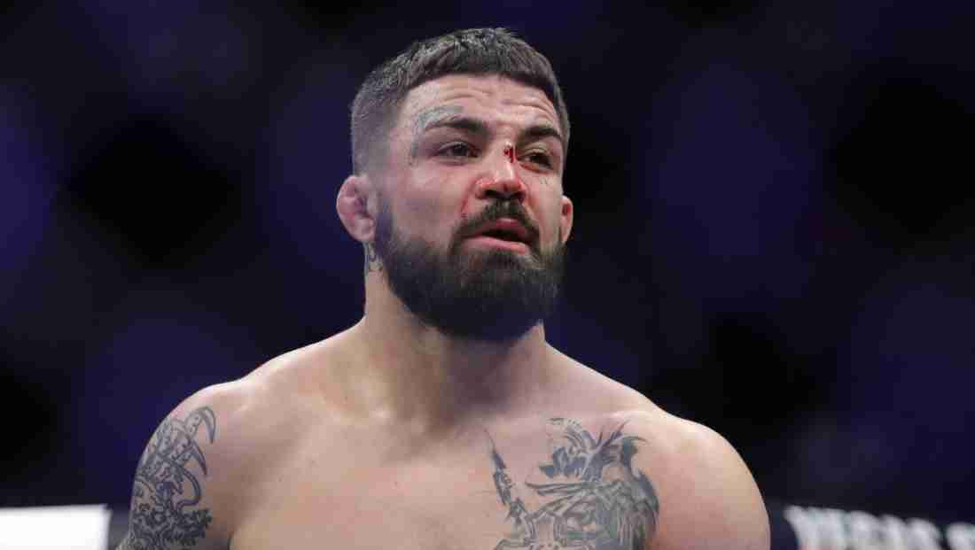 Mike Perry Shows Off Injury From Knocking Out Luke Rockhold's Tooth