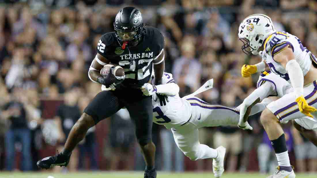 E.J. Smith's Family: Dad Emmitt Smith 'Proud' of Aggie Son