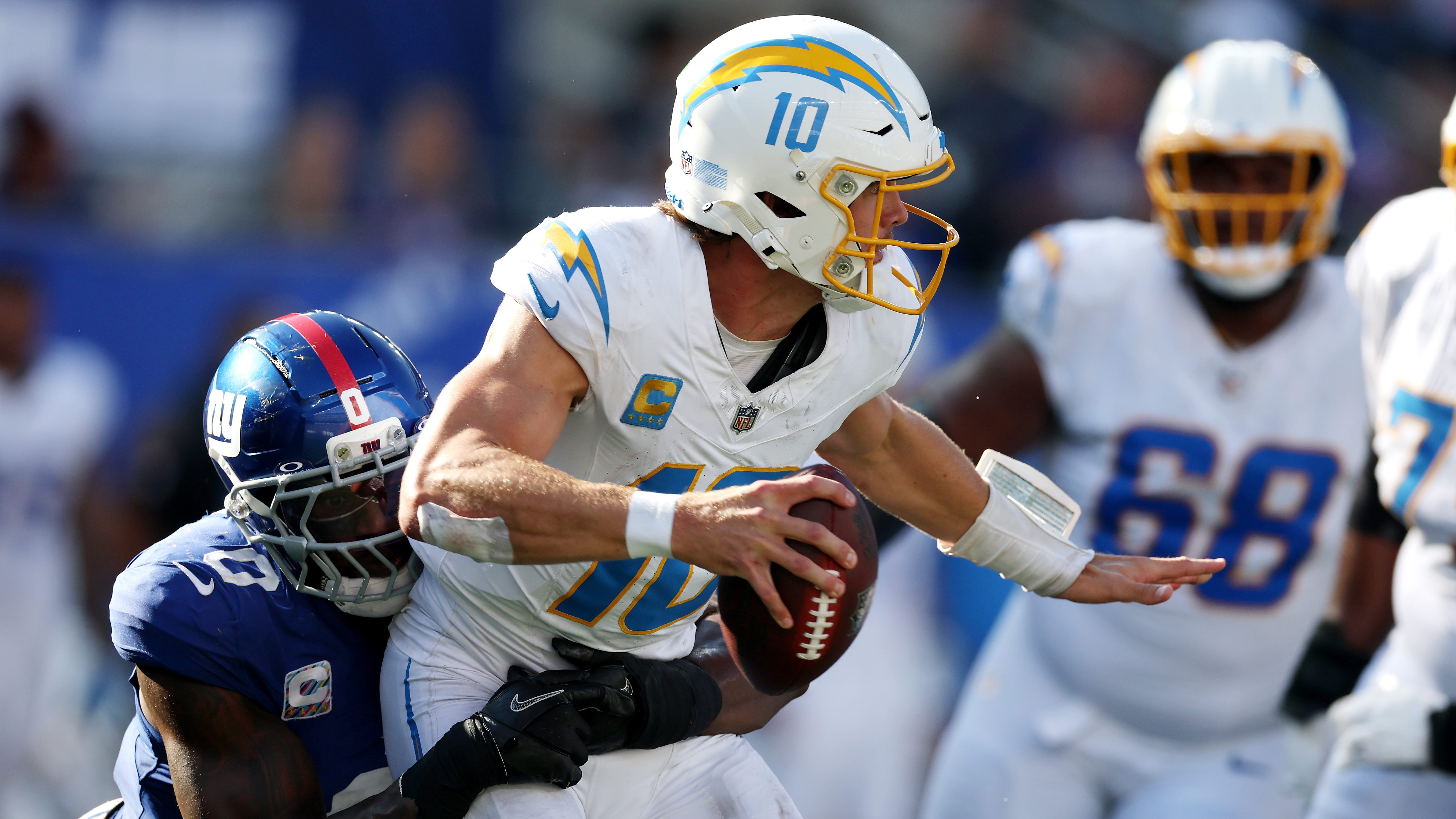 Chargers' Jim Harbaugh Addresses Frequent Hits For Justin Herbert
