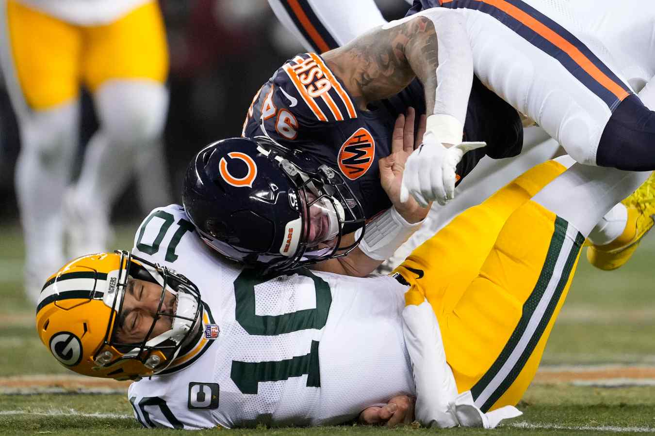 Bears DE Austin Booker Gets Double NFL Punishment After Injuring Jordan ...