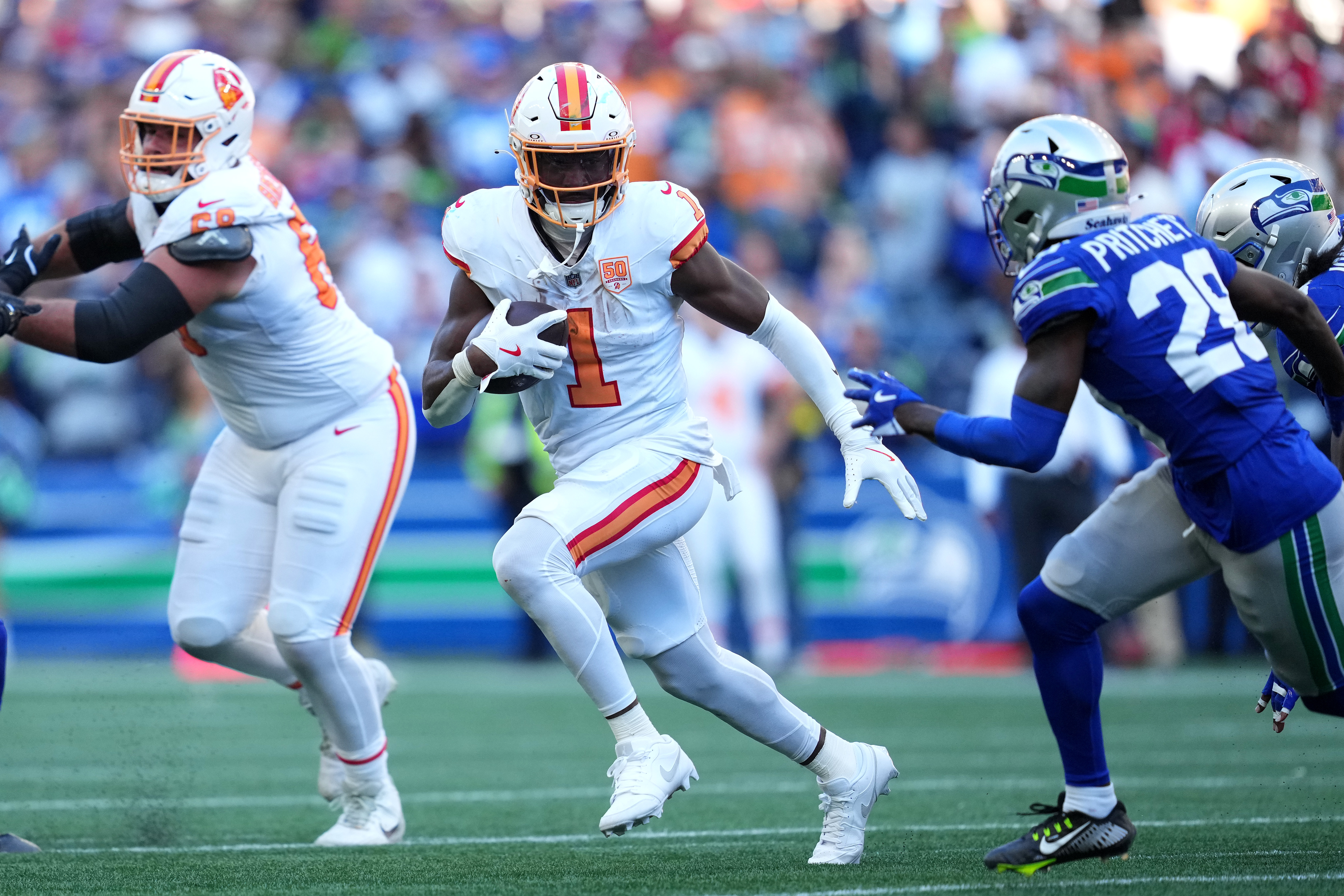 How Commanders Signing Rachaad White Affects RB Draft Plan